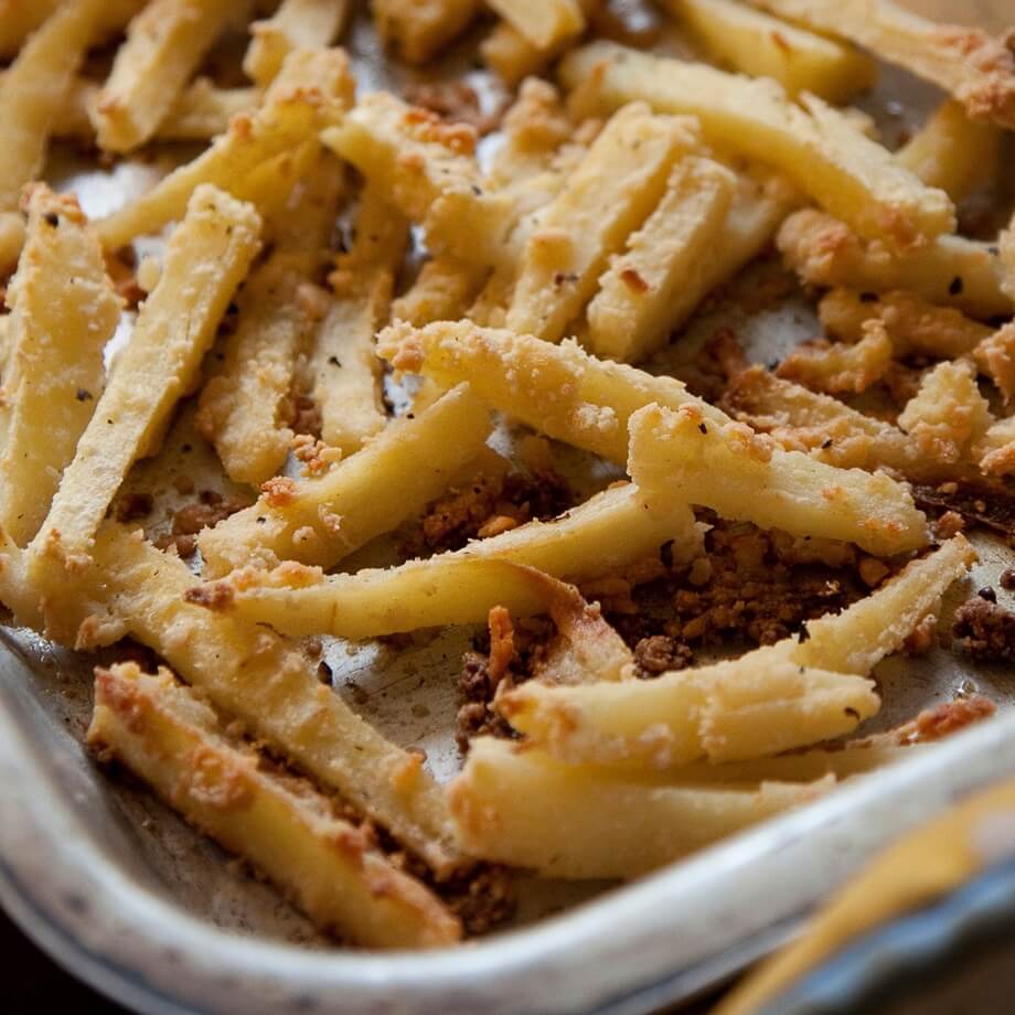 Parmesan-baked parsnips recipe / Riverford