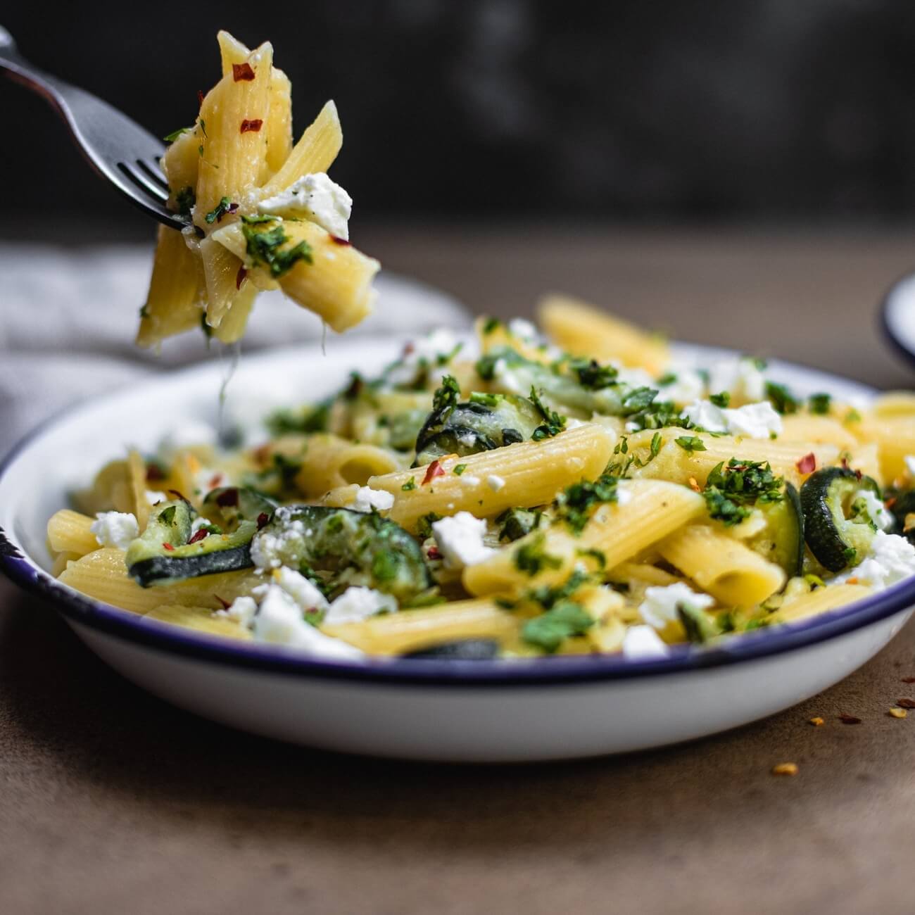 Courgette and sheep cheese pasta with gremolata recipe / Riverford