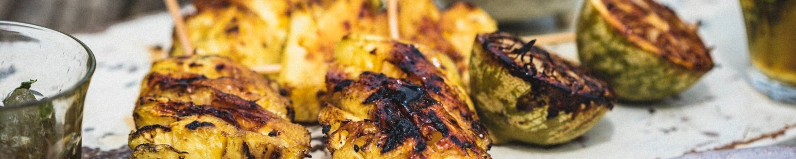 BBQ pineapple sticks with sugar, chilli, lime and salt / Riverford