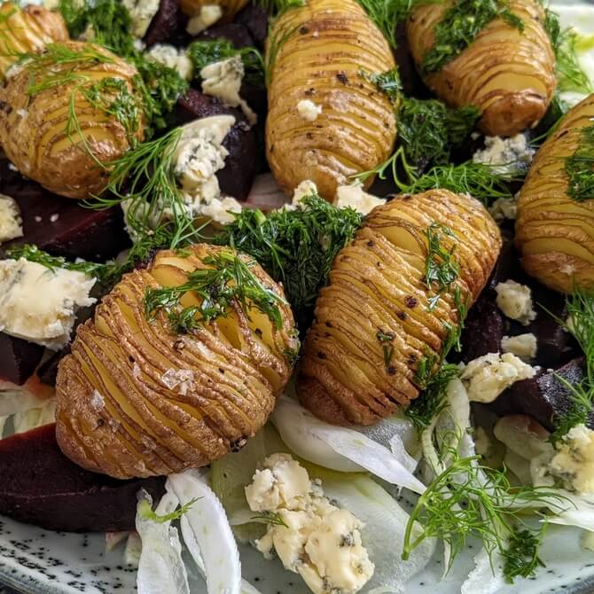 Hasselback potato salad with beetroot, stilton and fennel / Riverford