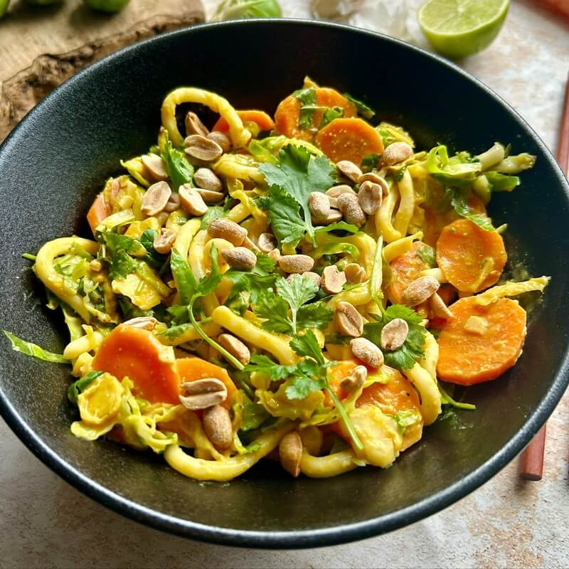 Shredded sprout & peanut stir-fry noodles recipe / Riverford
