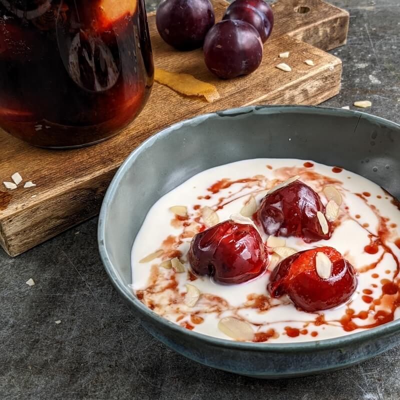 Plums in syrup with lemon peel and cinnamon recipe / Riverford