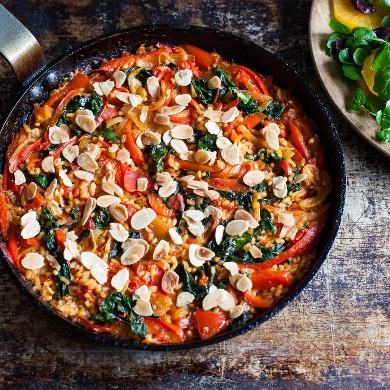 Red pepper and wild garlic paella with orange salad / Riverford