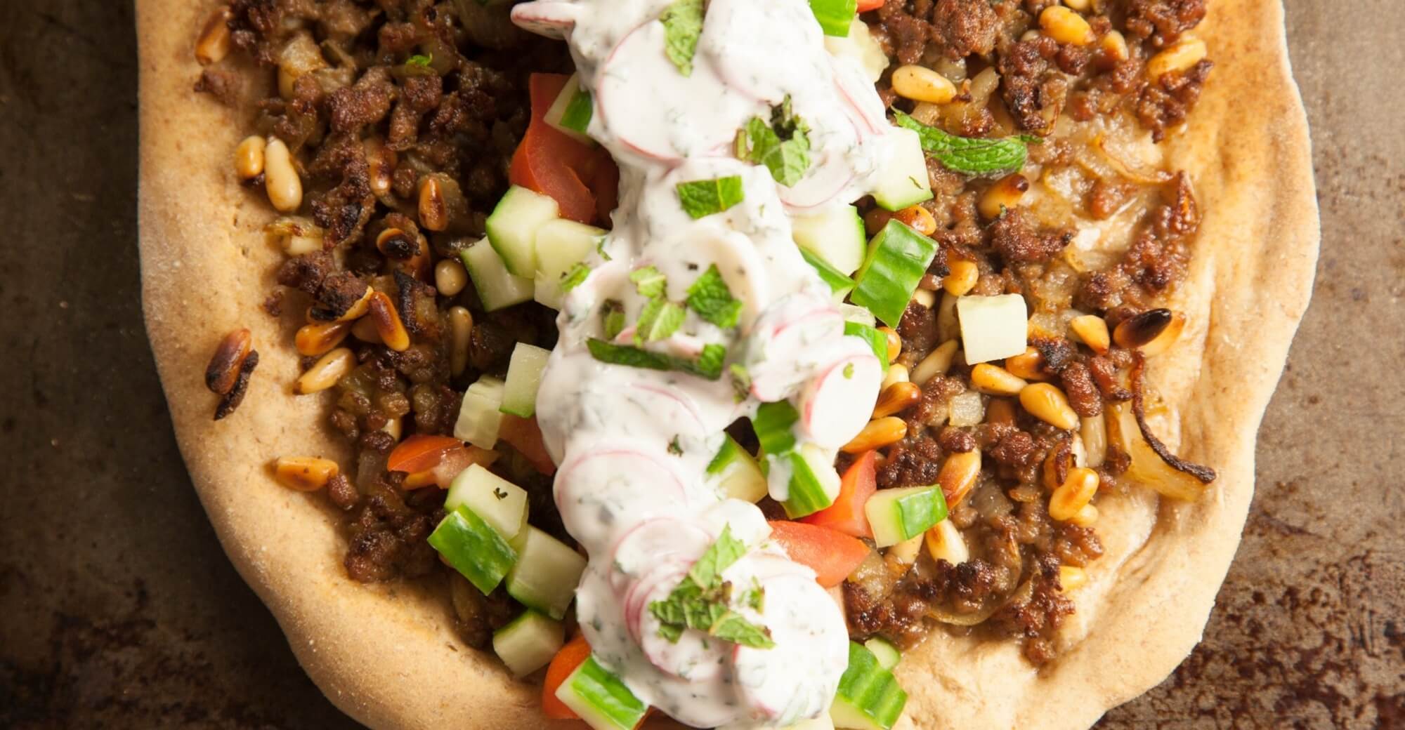 Turkish pizza with radish and mint tzatziki recipe / Riverford
